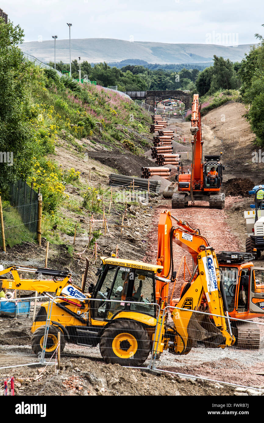 Diggers in use during construction of the Borders Railway , Scotland ...