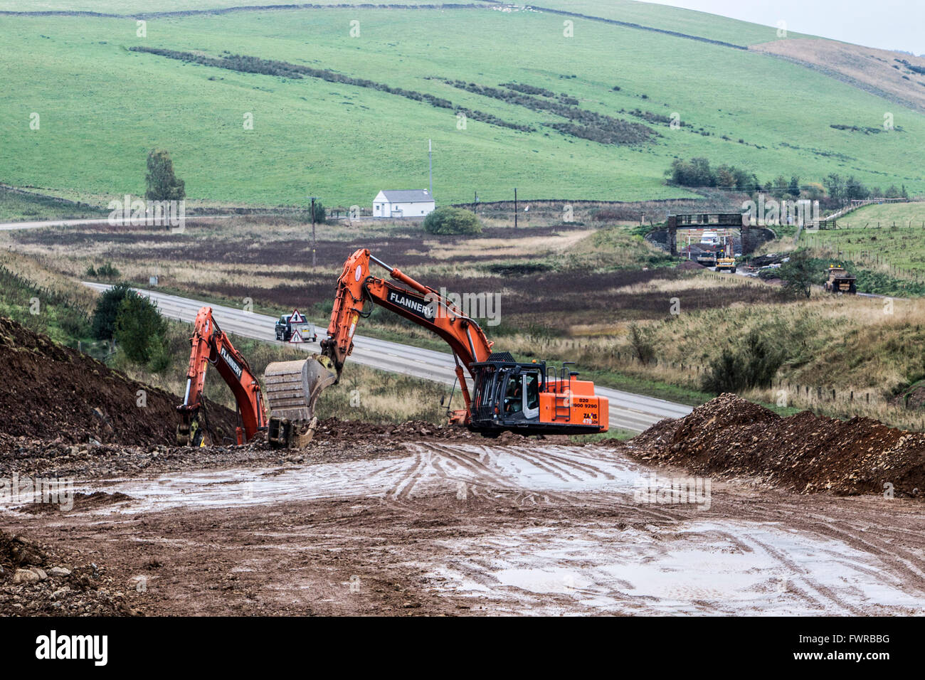 Diggers in use during construction of the Borders Railway , Scotland ...