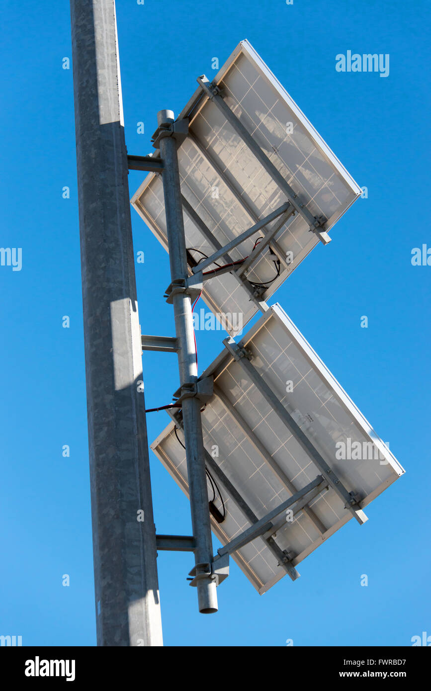 installation of two small solar panels Stock Photo - Alamy