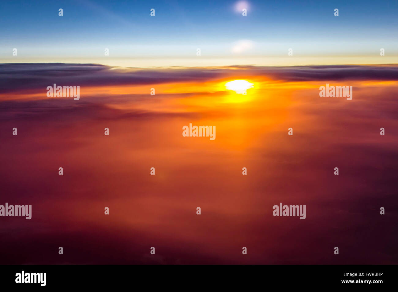 Clouds and sun over the skies of Europe at the height of flight of the ...