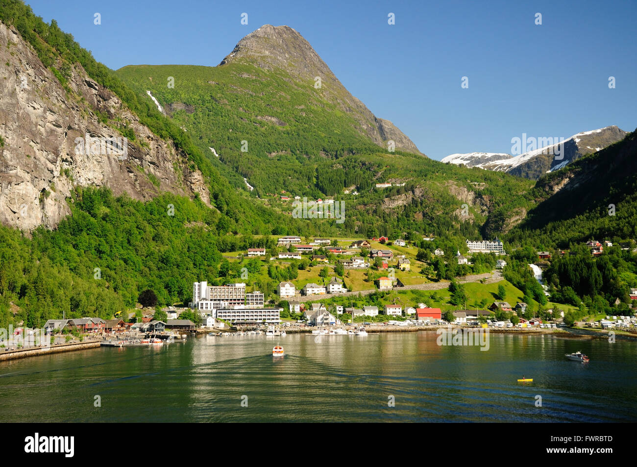 Evening view of Geiranger village, at the head of the Geirangerfjord ...
