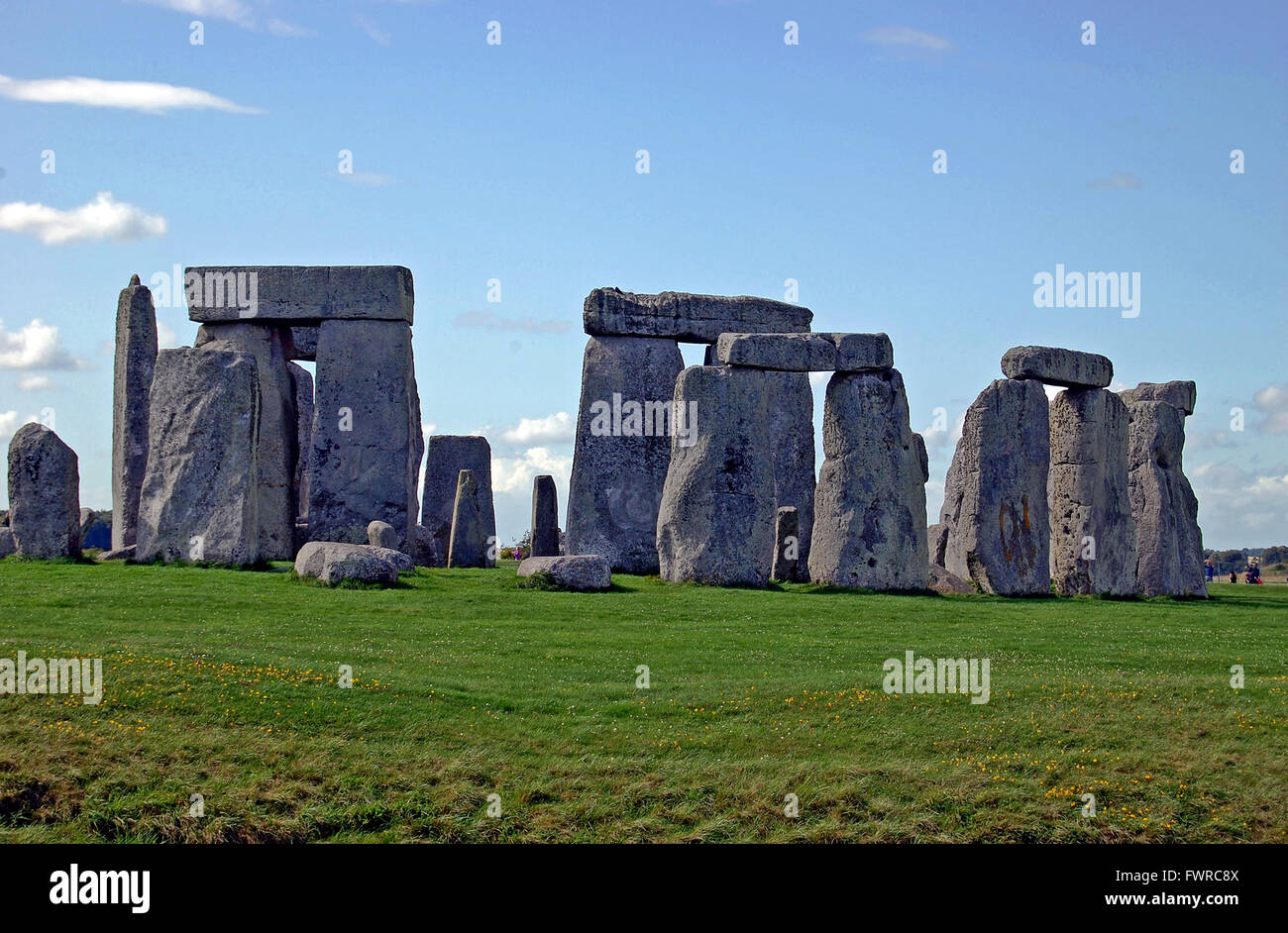 The stone circle at Stonehenge, looks magnificent, beneath a blue sky ...