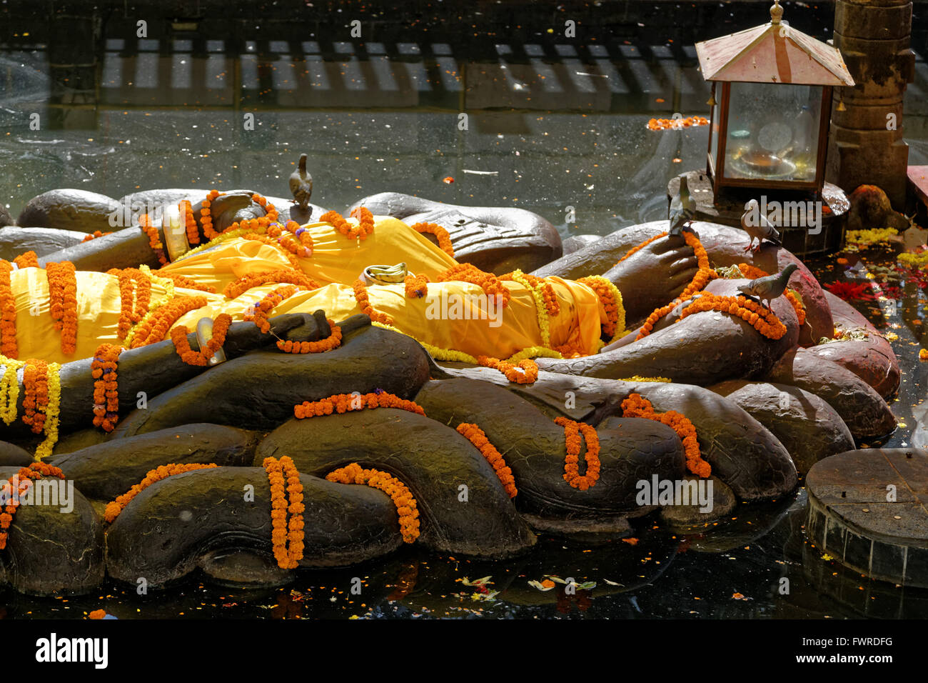 Vishnu Narayana rests asleep on the serpent with multiple convolutions ...