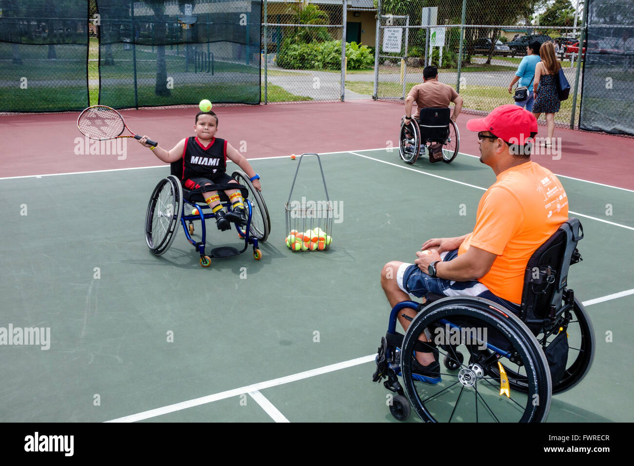 Wheelchair hispanic male boy tennis hi-res stock photography and images ...