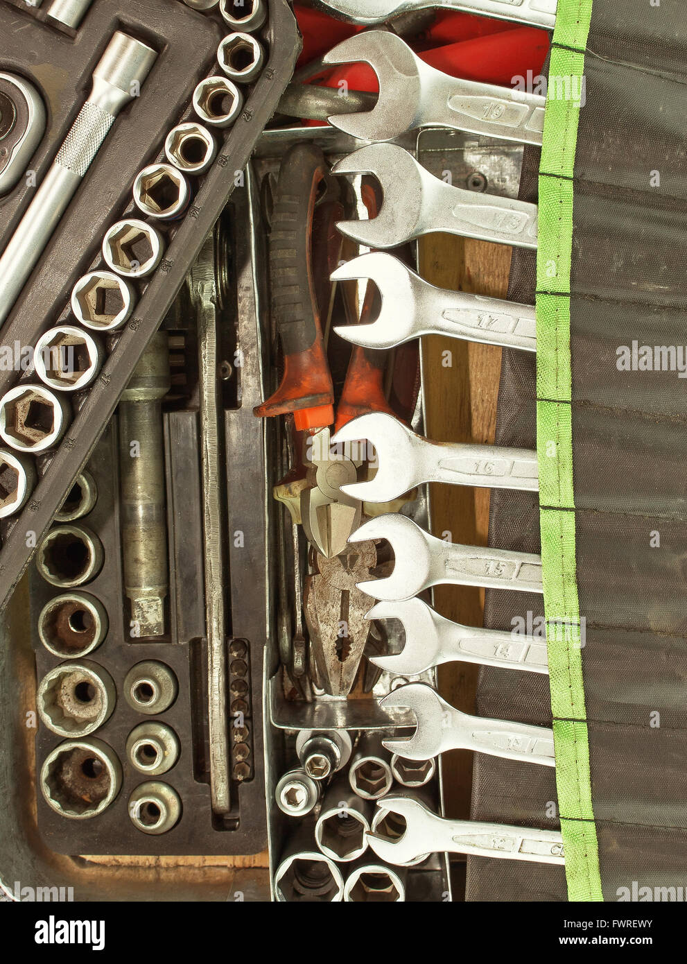 Dirty set of hand tools on a vintage background Stock Photo - Alamy