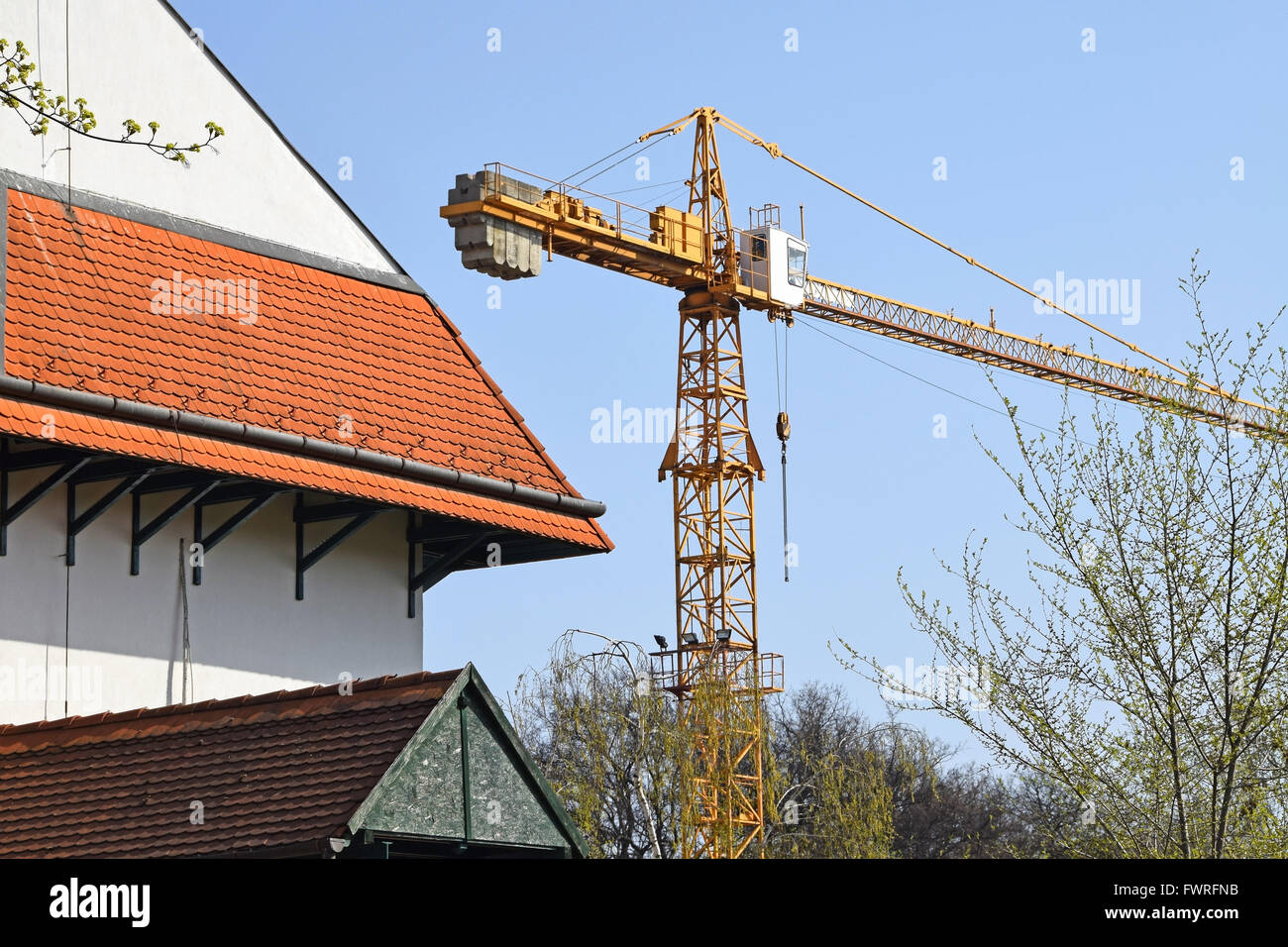 Tower crane at the construction site Stock Photo - Alamy