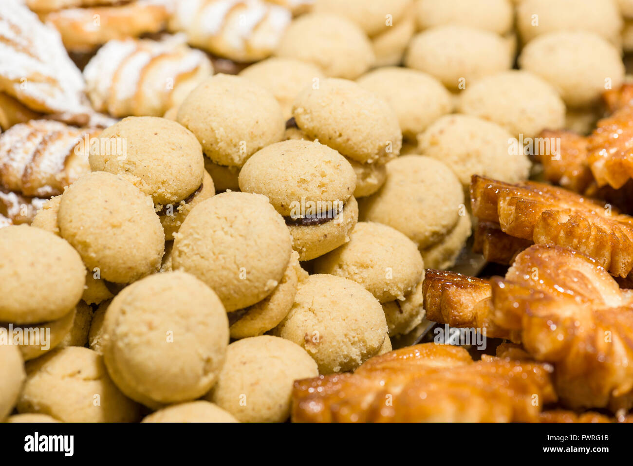 pastries of flour with chocolate topping Stock Photo - Alamy
