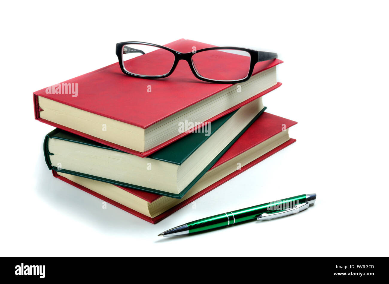 Stack of books, a pen and reading glasses isolated on white Stock Photo ...