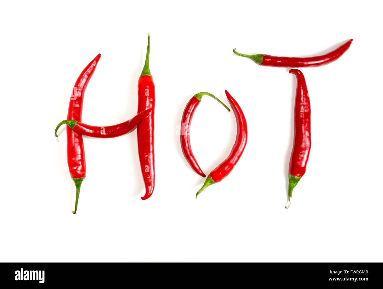 Word hot written from red pepper letters on white background Stock ...
