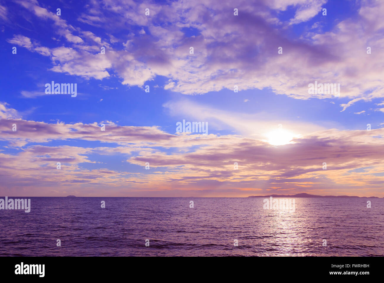 Beautiful Sunset on the beach with dramatic orange and dark shade of ...