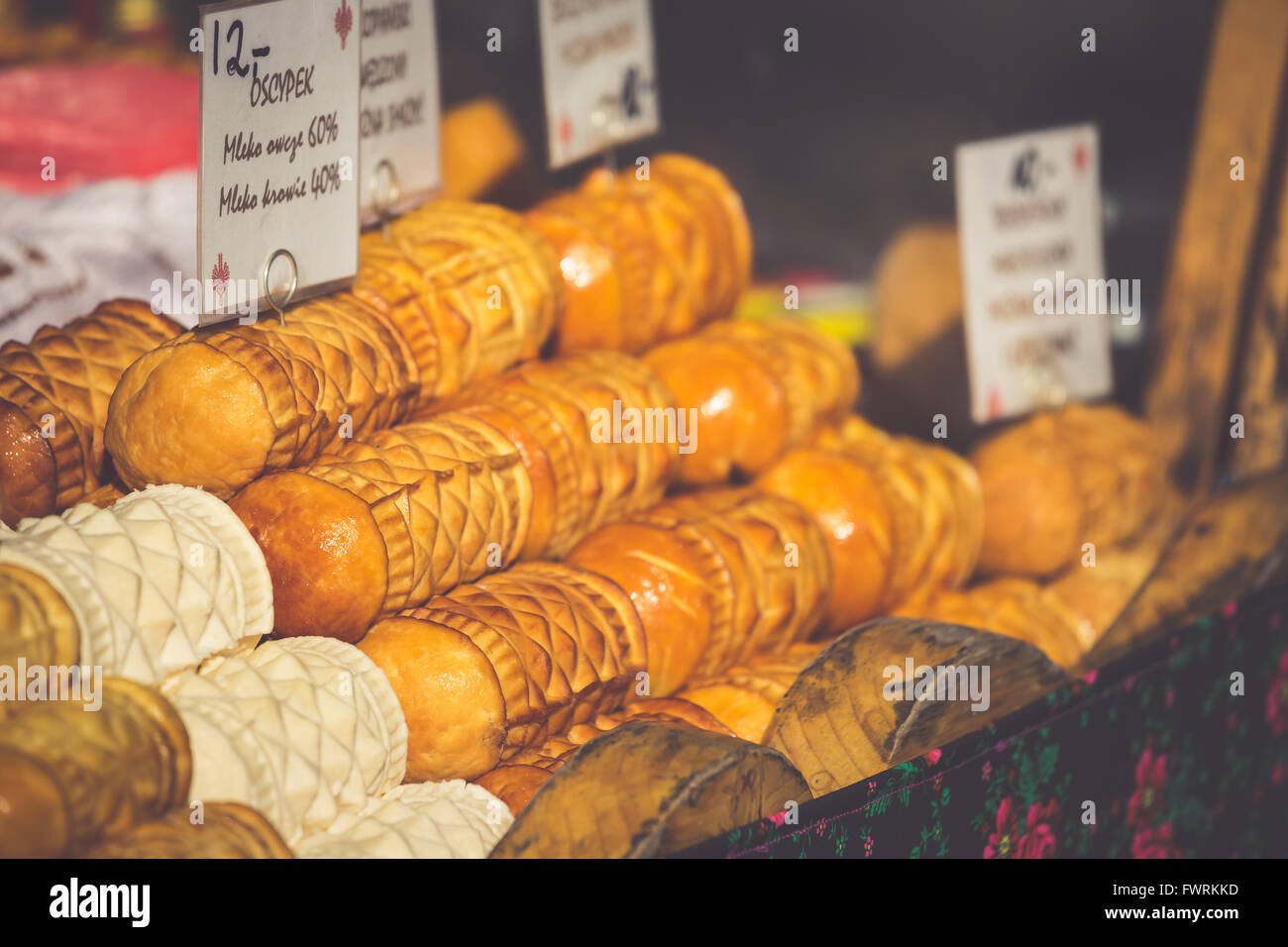 Traditional polish smoked cheese oscypek on outdoor market in Zakopane ...
