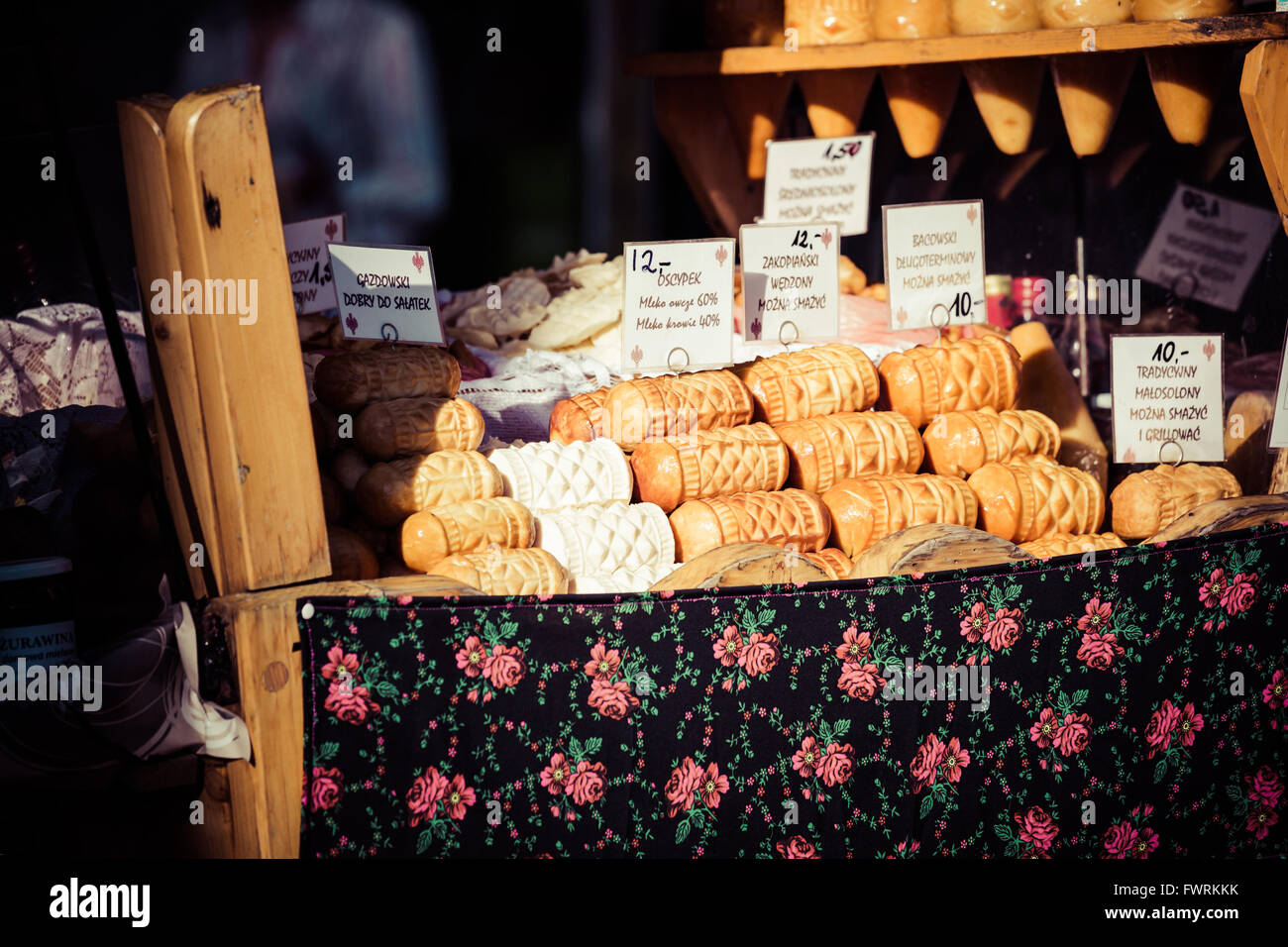 Traditional polish smoked cheese oscypek on outdoor market in Zakopane ...