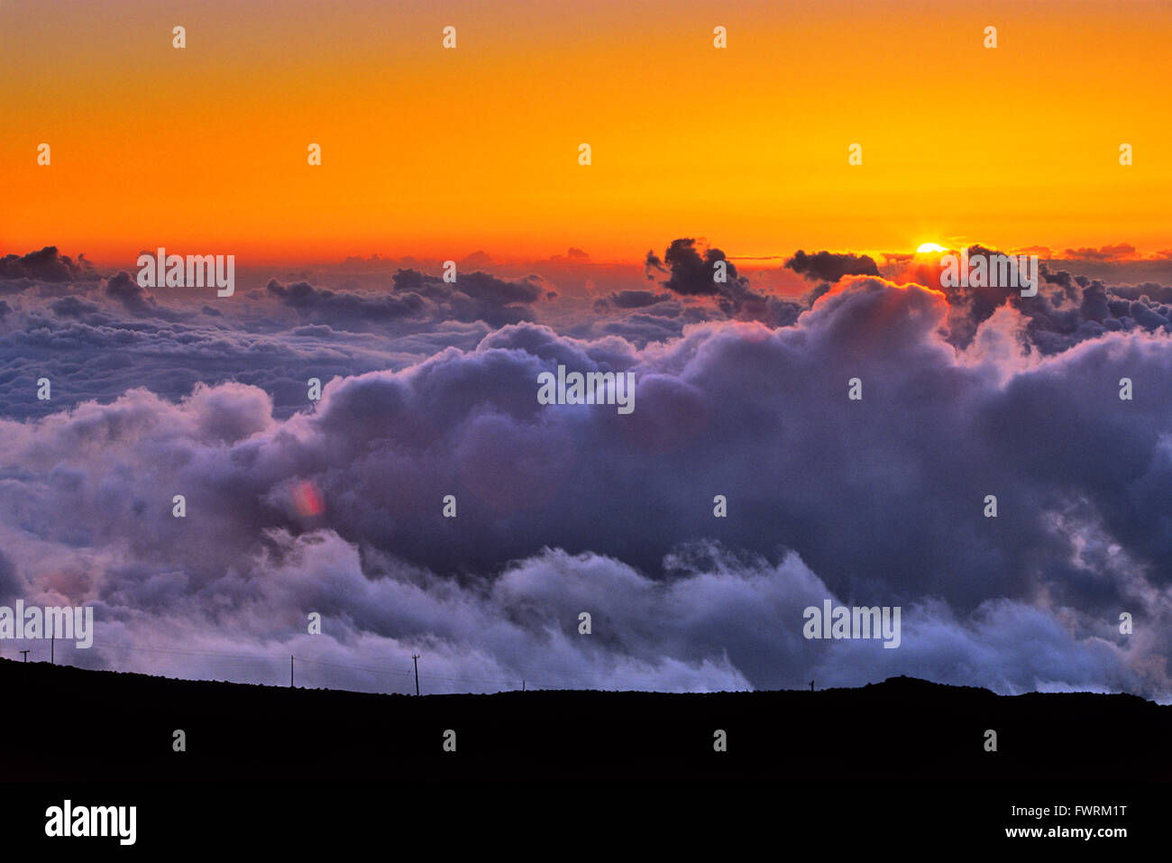 sunrise seen from the summit of the Haleakala volcano crater Maui Stock ...