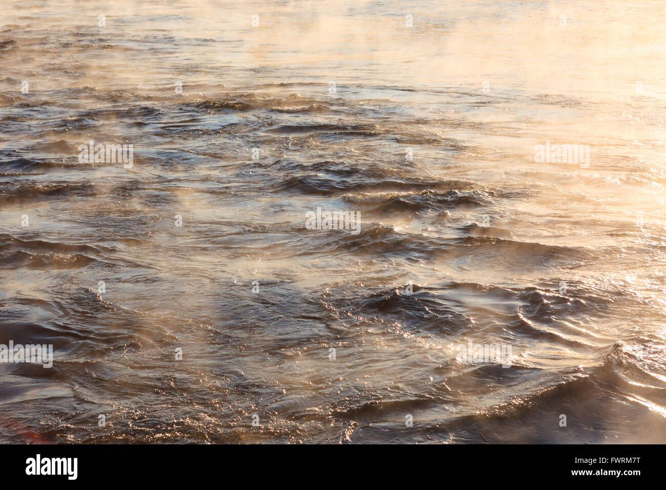 Water vapor on surface of cold water Stock Photo - Alamy
