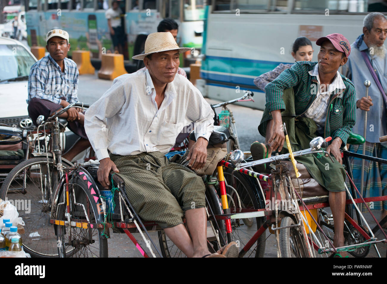 Rickshaw drivers relaxing, Yangon, Myanmar Stock Photo - Alamy