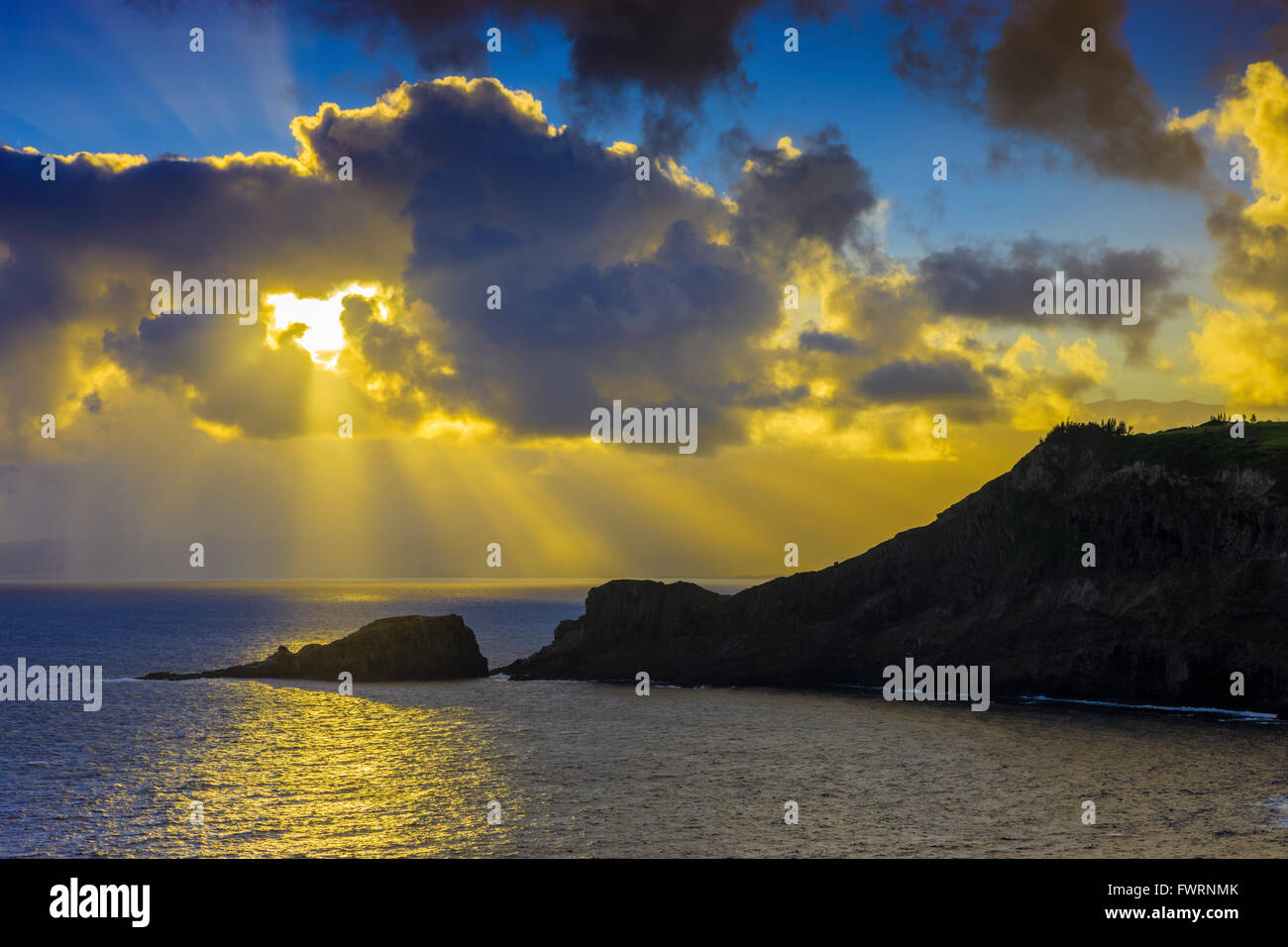 North shore Maui sunset over ocean and sea cliffs Stock Photo - Alamy