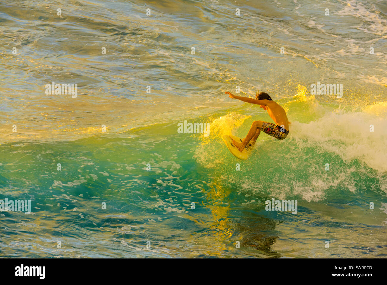 Surfing in Maui Stock Photo - Alamy