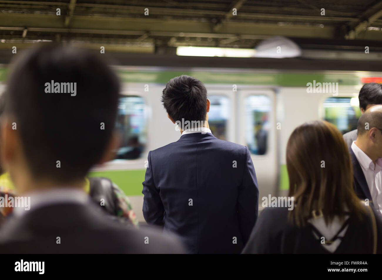 Passengers traveling by Tokyo metro Stock Photo - Alamy