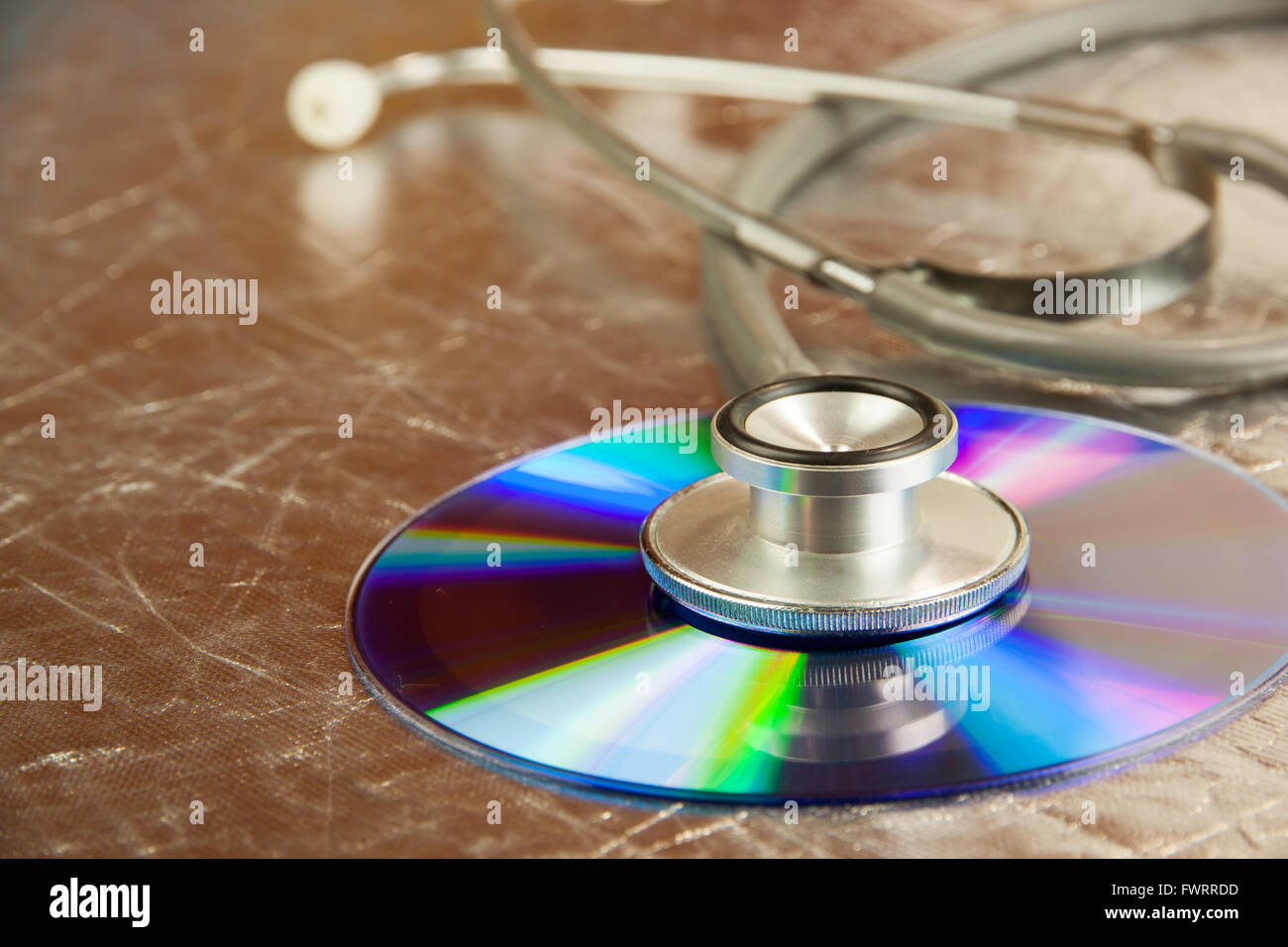 Disk CD and stethoscope on reflection shiny sparkle background Stock ...