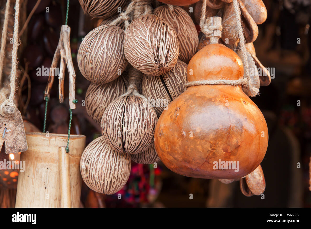 Dry calabash and other seeds on hanging a row Stock Photo - Alamy