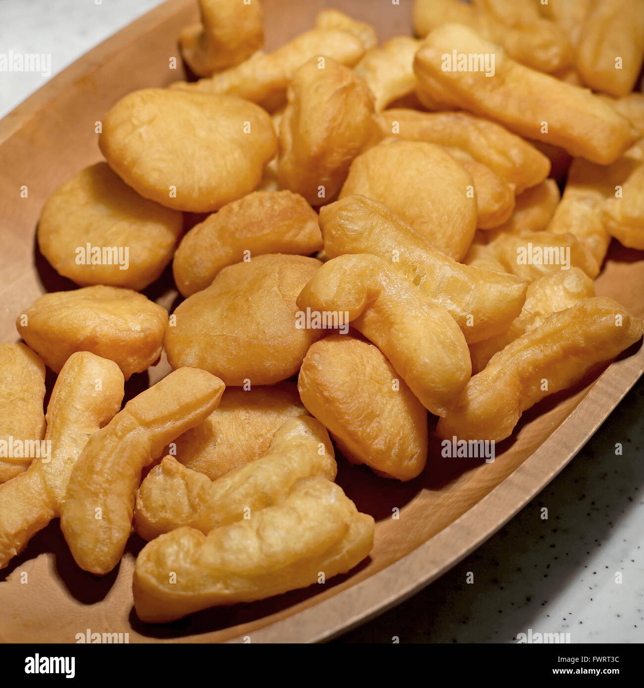 deep fried doughstick for breakfast meal on buffet line Stock Photo - Alamy