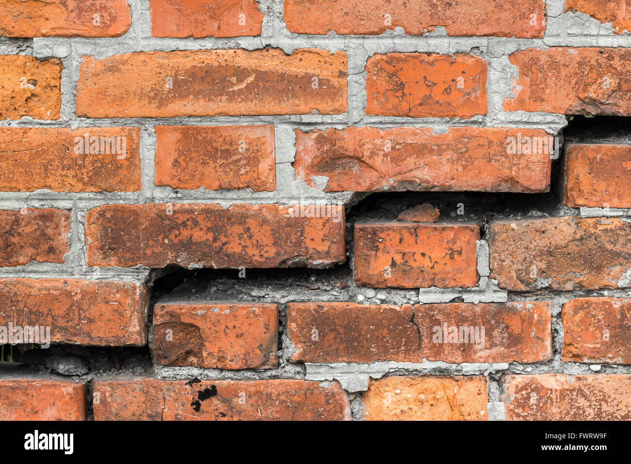 Old damaged brick wall, grunge background Stock Photo - Alamy
