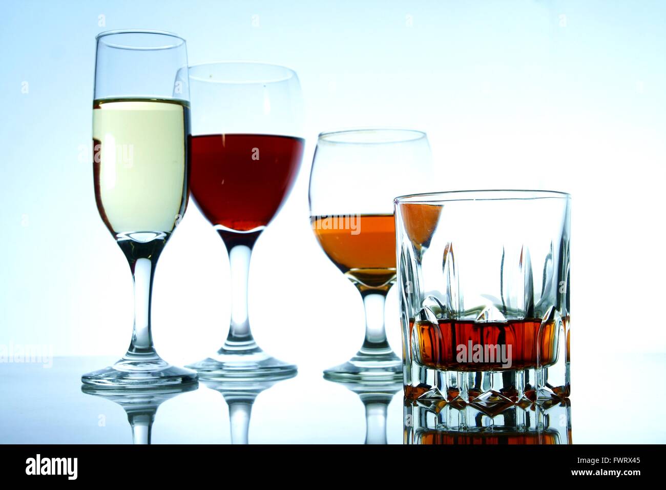 Different Alcoholic Drinks in glass and goblets Stock Photo - Alamy