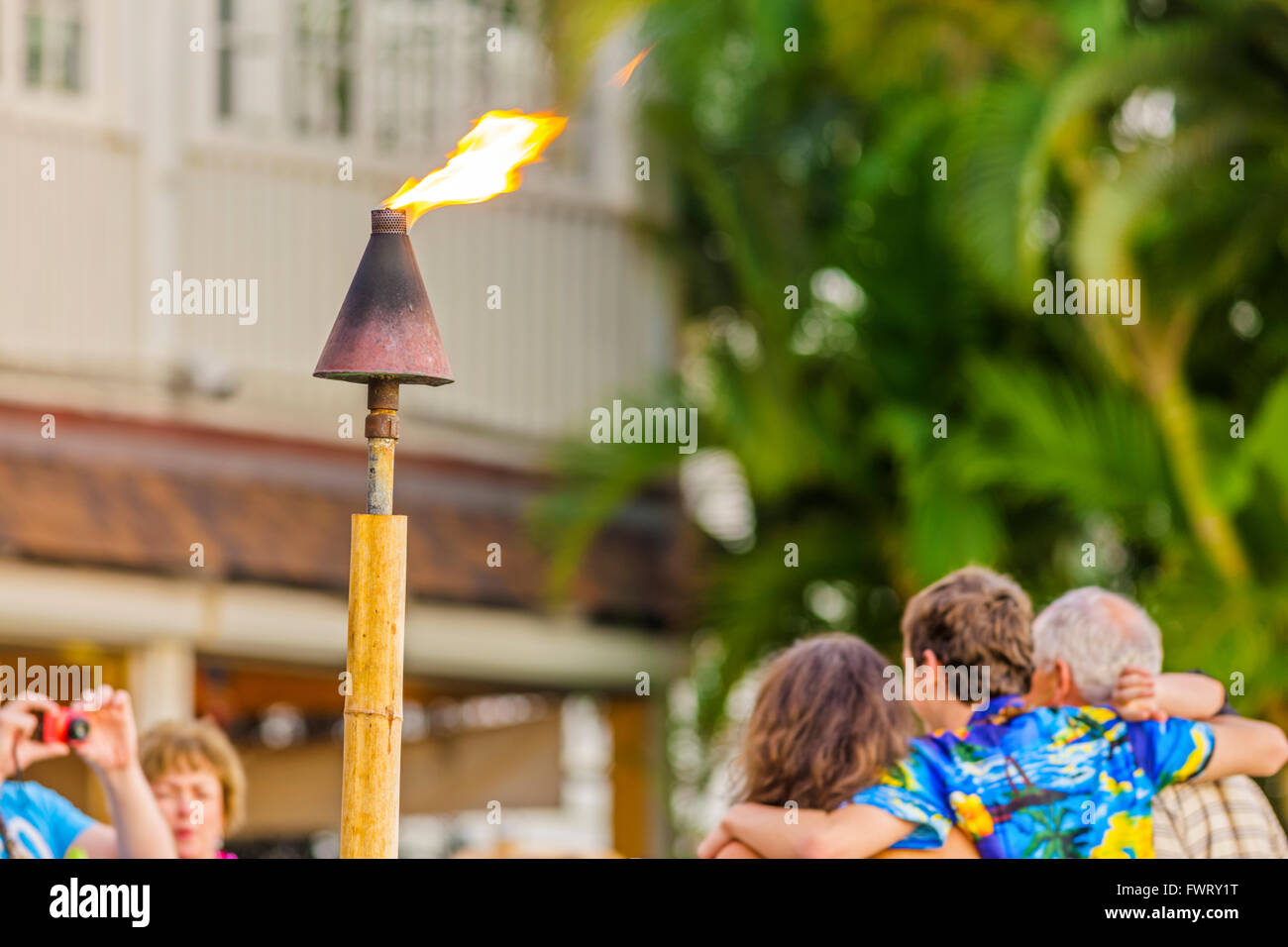 Maui tourists posing for picture Stock Photo - Alamy