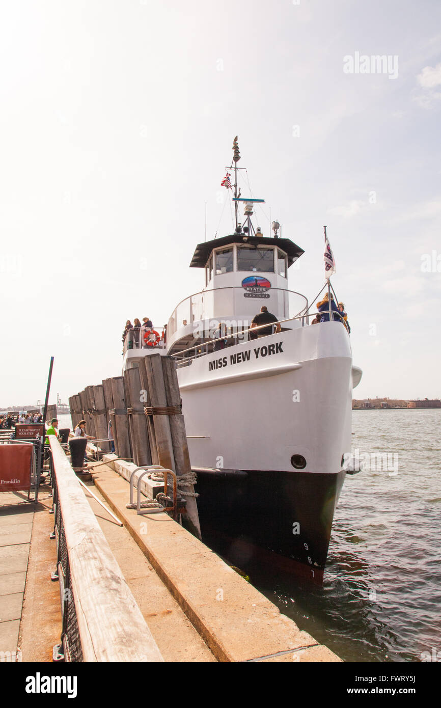 Statue Cruises passenger ferry taking tourists to the Statue of Liberty ...