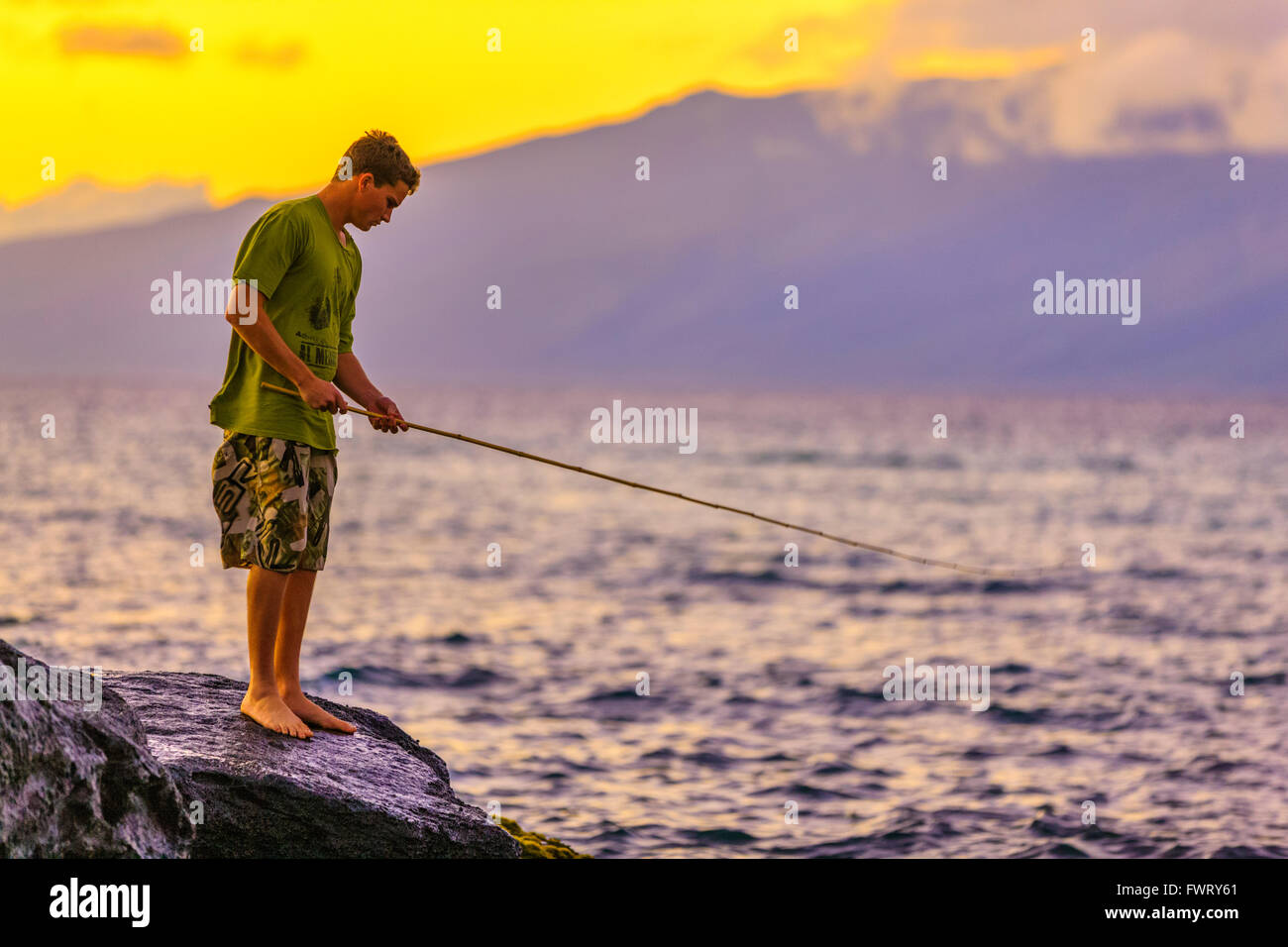 fishing on Maui coast Stock Photo - Alamy