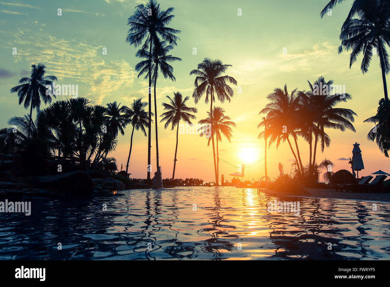 Amazing sunset at a beach resort in the tropics Stock Photo - Alamy