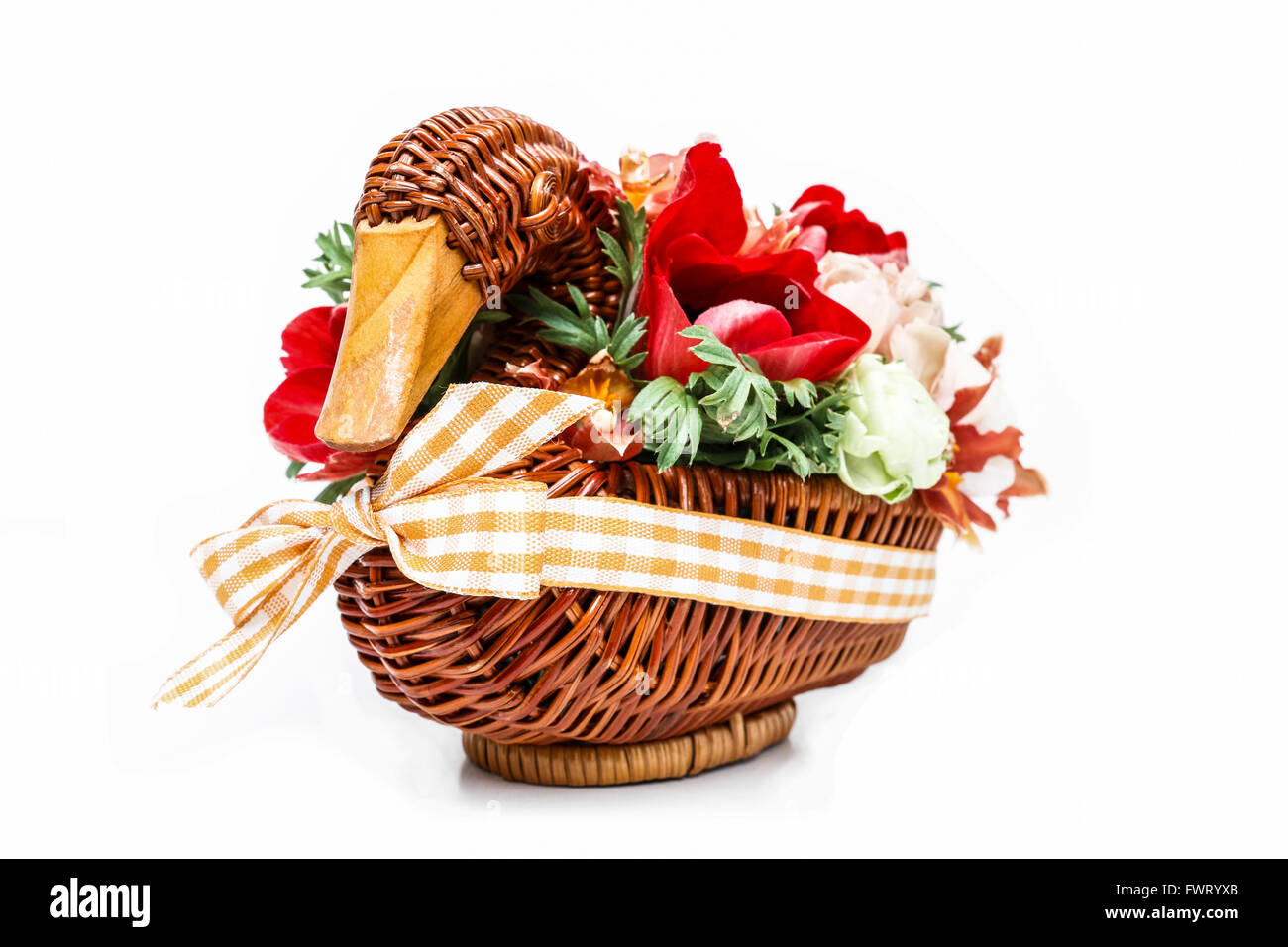 Bouquet of flowers in wicker goose. Table centerpiece idea for St ...