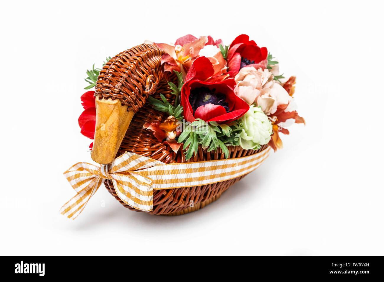 Bouquet of flowers in wicker goose. Table centerpiece idea for St ...