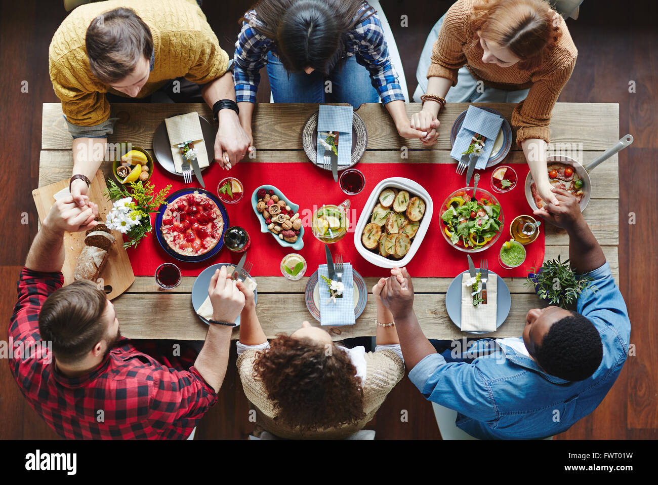 Pray before dinner Stock Photo - Alamy