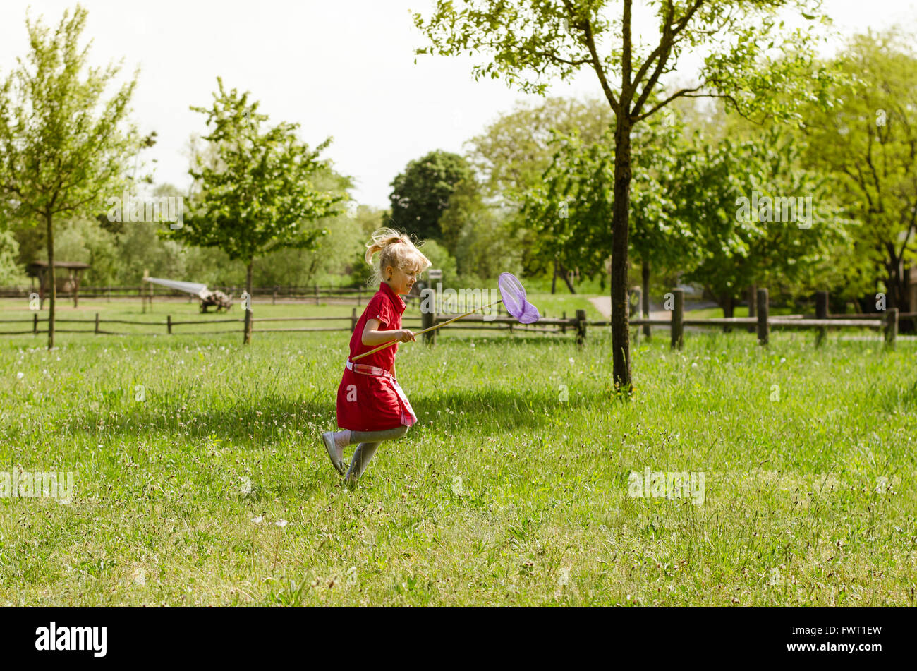 Girl running butterfly hi-res stock photography and images - Alamy