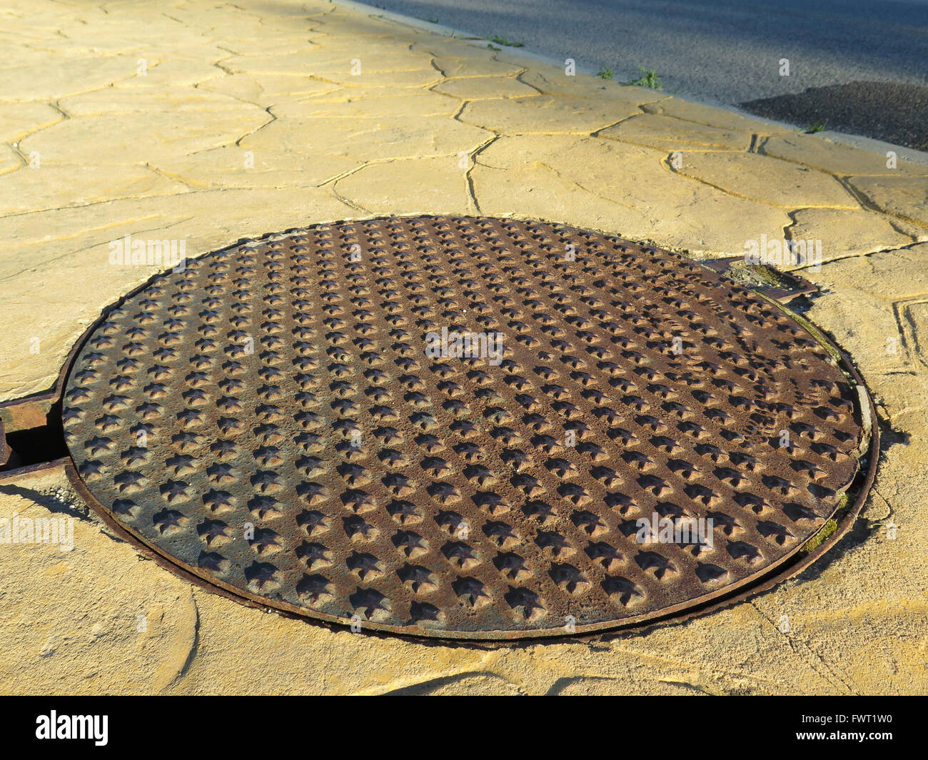 Cast iron manhole cover hi-res stock photography and images - Alamy