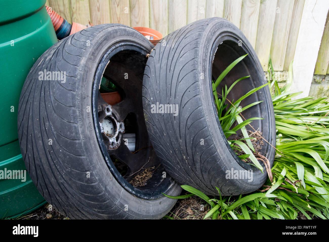 Two tyres stacked hi-res stock photography and images - Alamy