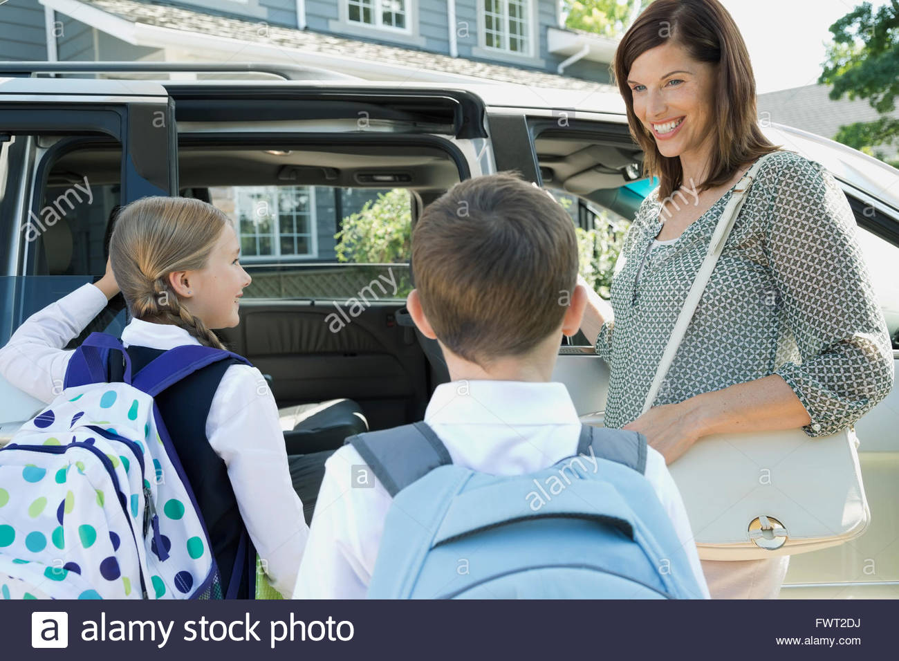 Kids car school uniform hi-res stock photography and images - Alamy
