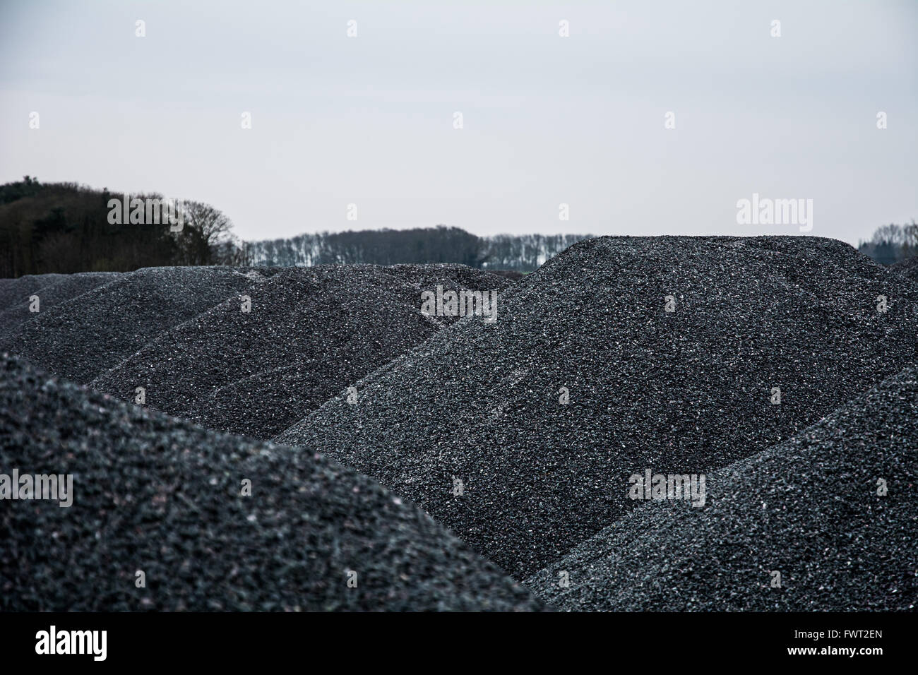 Piles of asphalt stones waiting to be laid during roadworks Stock Photo ...