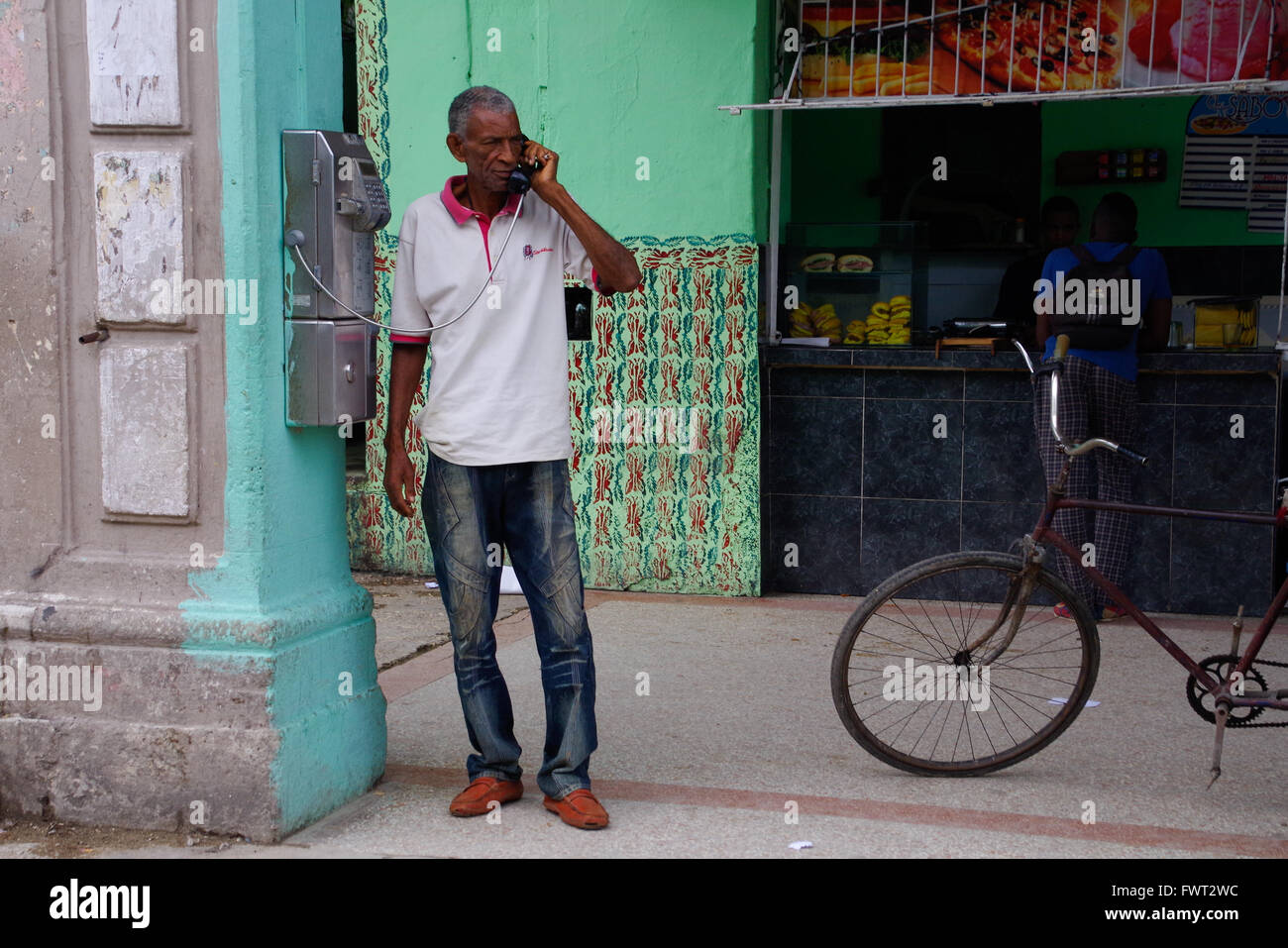 Using a public payphone hi-res stock photography and images - Alamy