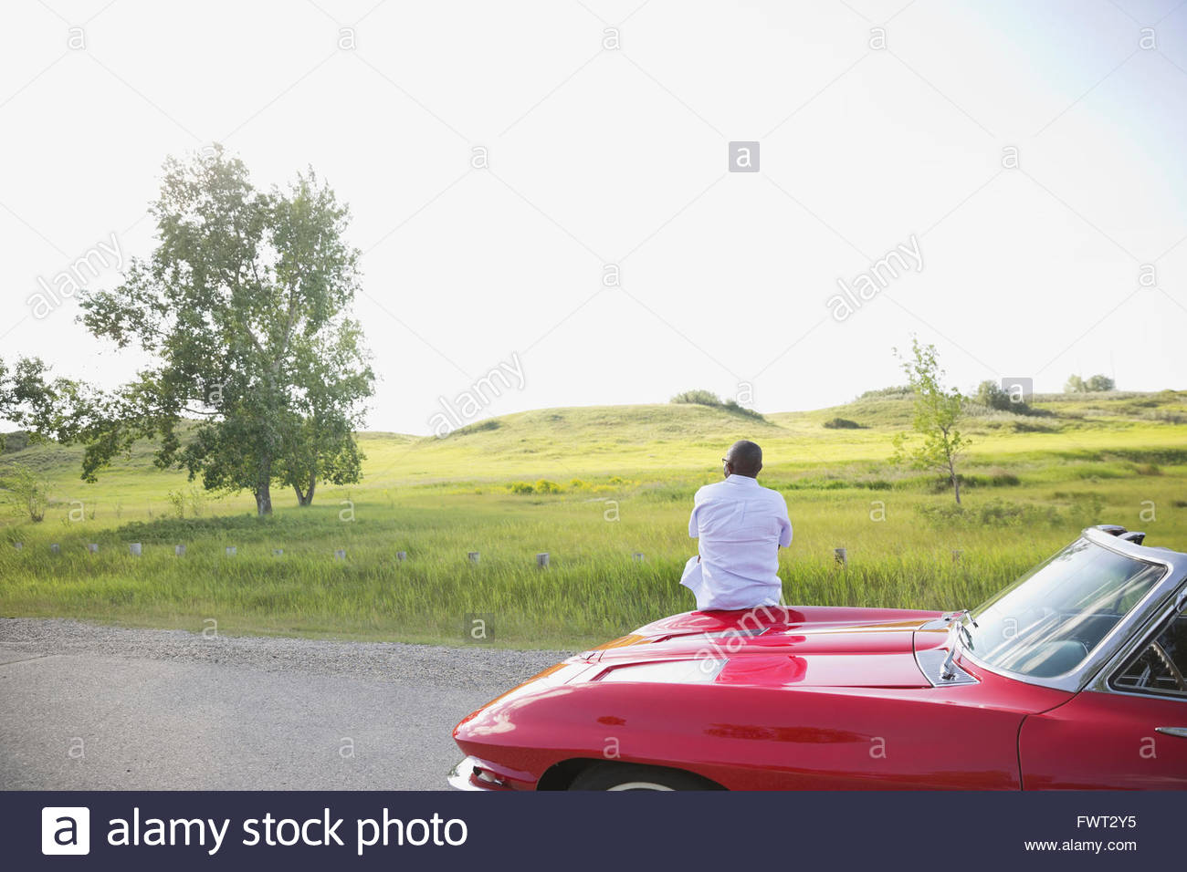 African man leaning on car hi-res stock photography and images - Alamy