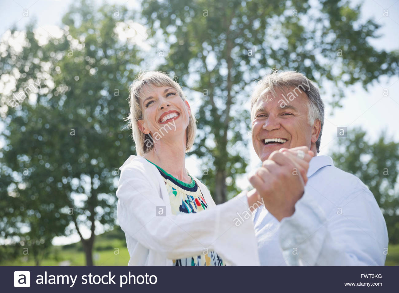 Two middle aged women dancing hi-res stock photography and images - Alamy