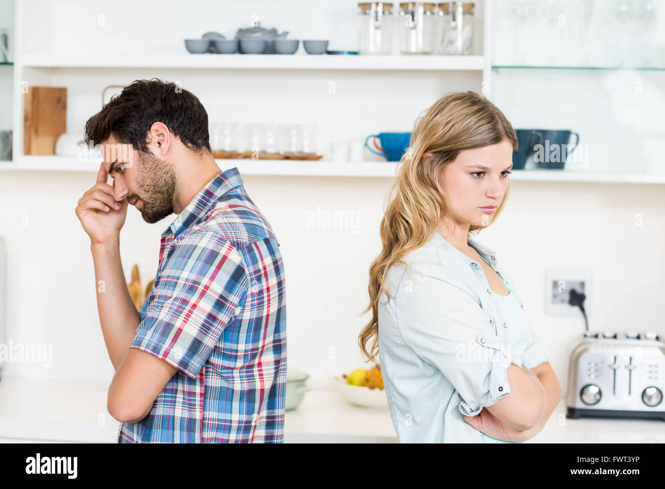 Young couple ignoring each other Stock Photo - Alamy