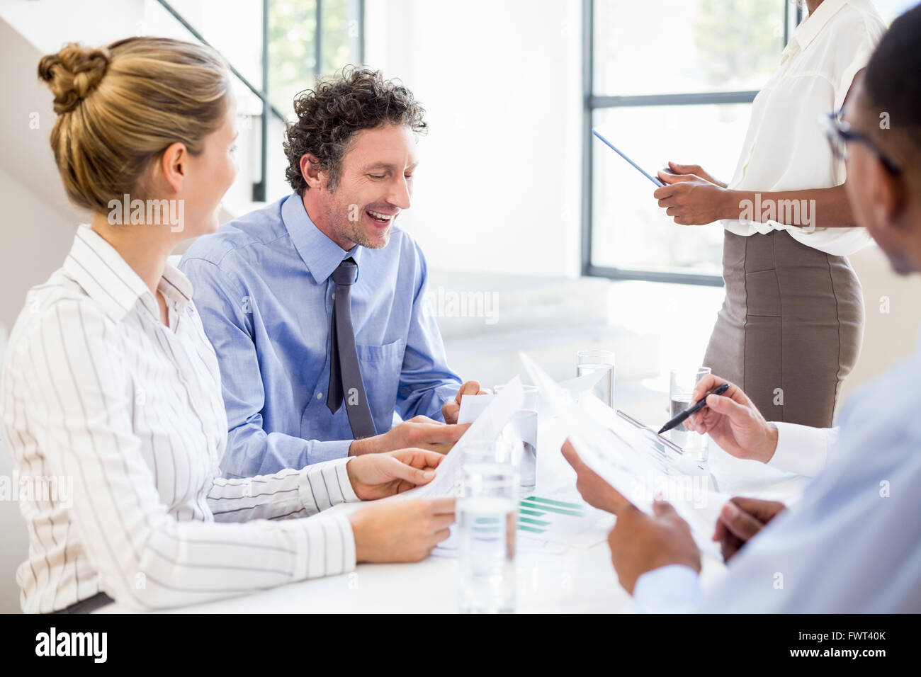 Business colleagues discussing in meeting Stock Photo - Alamy