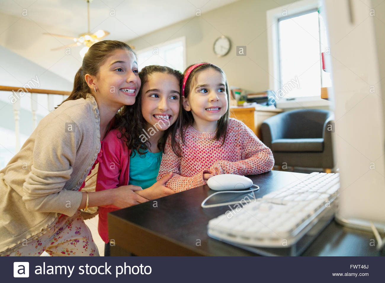 Child using desktop computer at home hi-res stock photography and ...