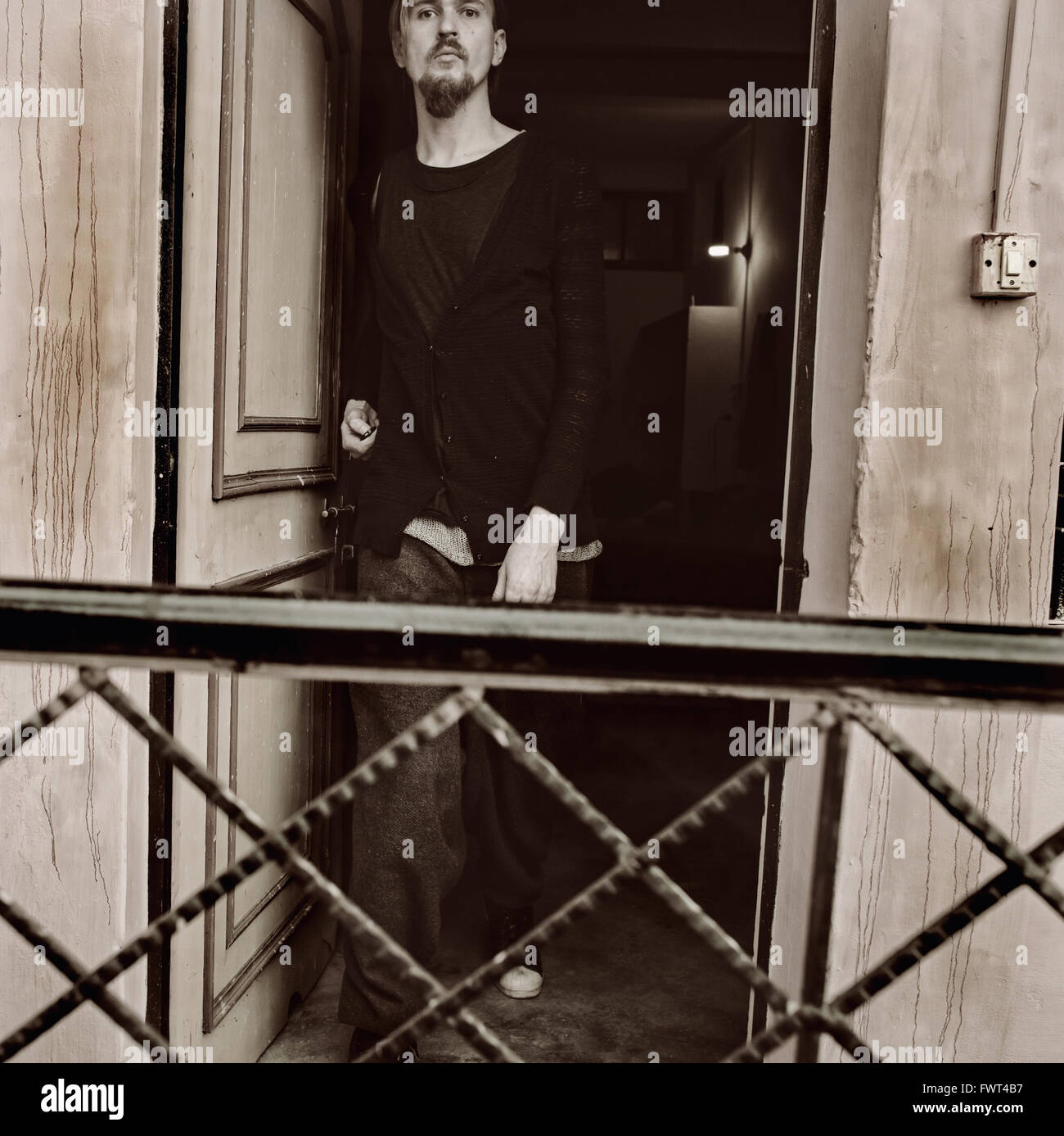 Person balcony hi-res stock photography and images - Alamy