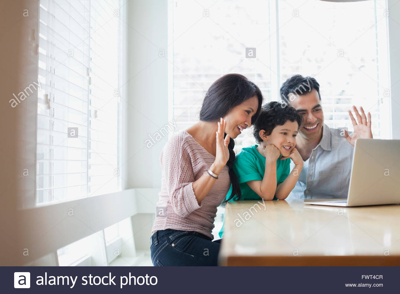 Two boys chatting indoors hi-res stock photography and images - Alamy