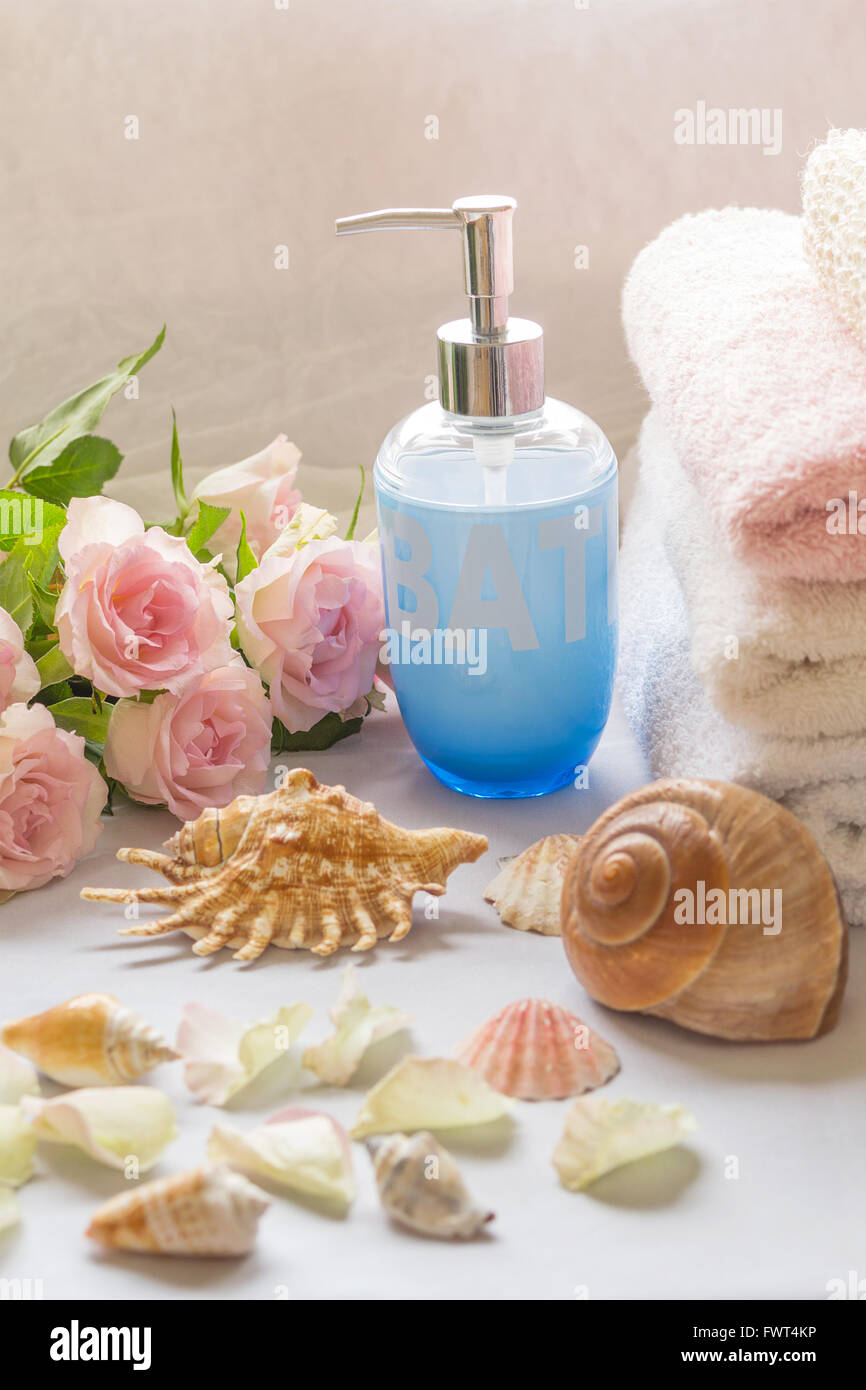 Bath arrangement with romantic pink roses and seashells Stock Photo - Alamy