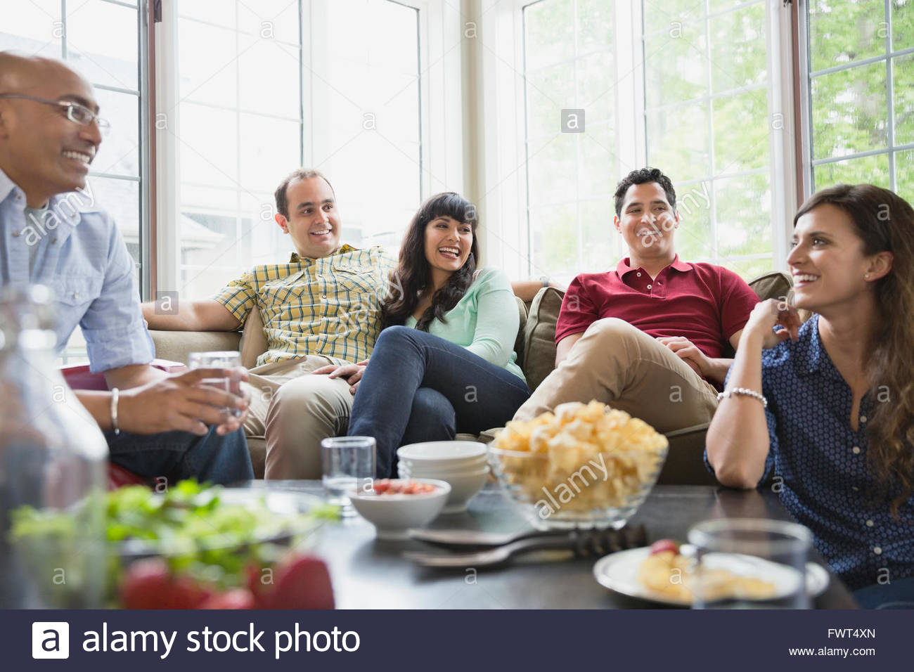 Adult social gathering candid hi-res stock photography and images - Alamy