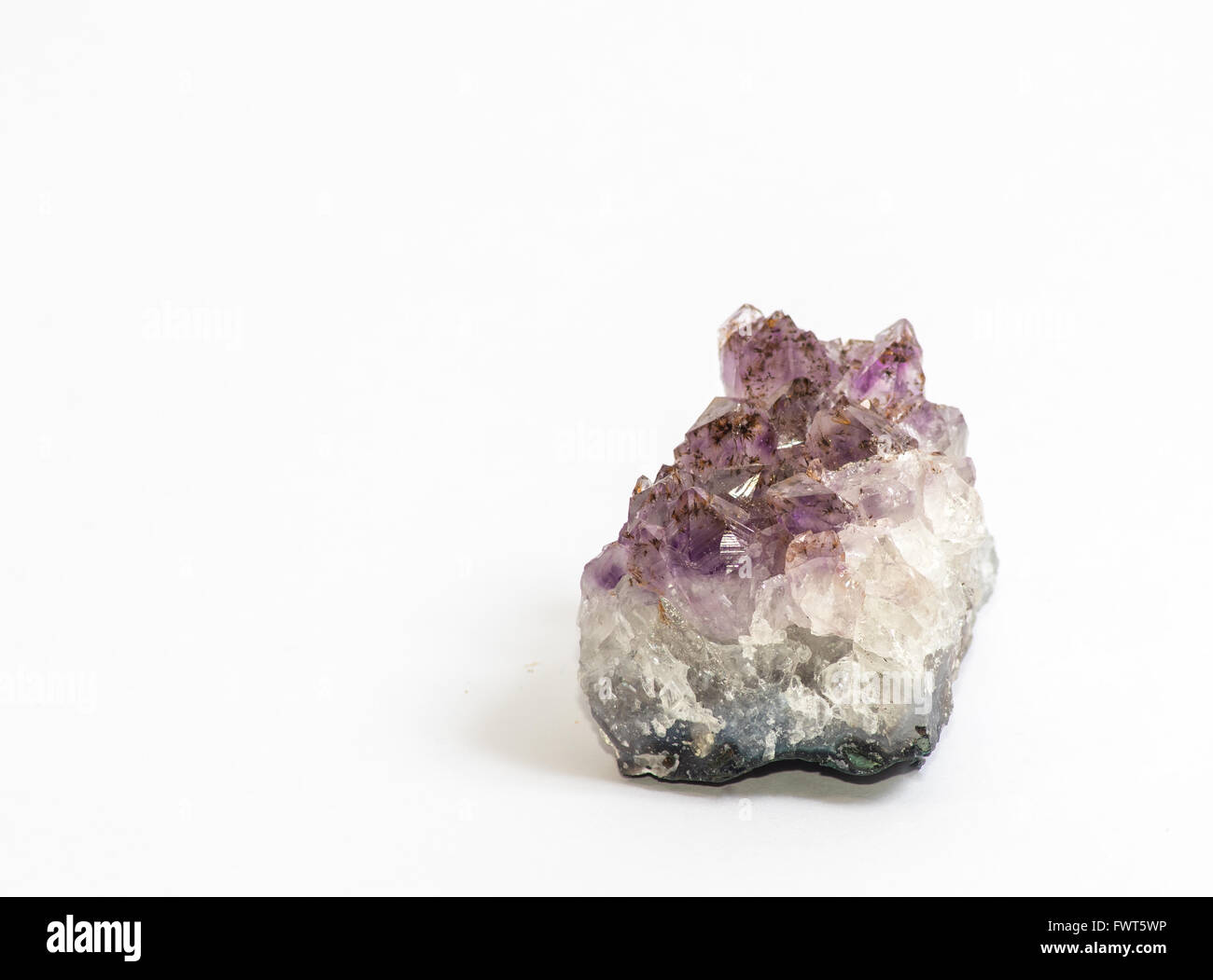 Crystals of the violet coloured gemstone Amethyst Stock Photo - Alamy
